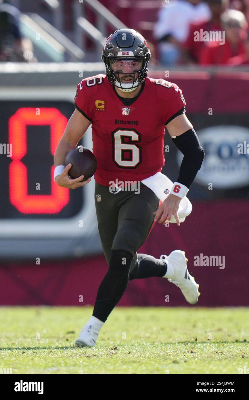 Tampa Bay Buccaneers quarterback Baker Mayfield (6) runs for a big gain ...