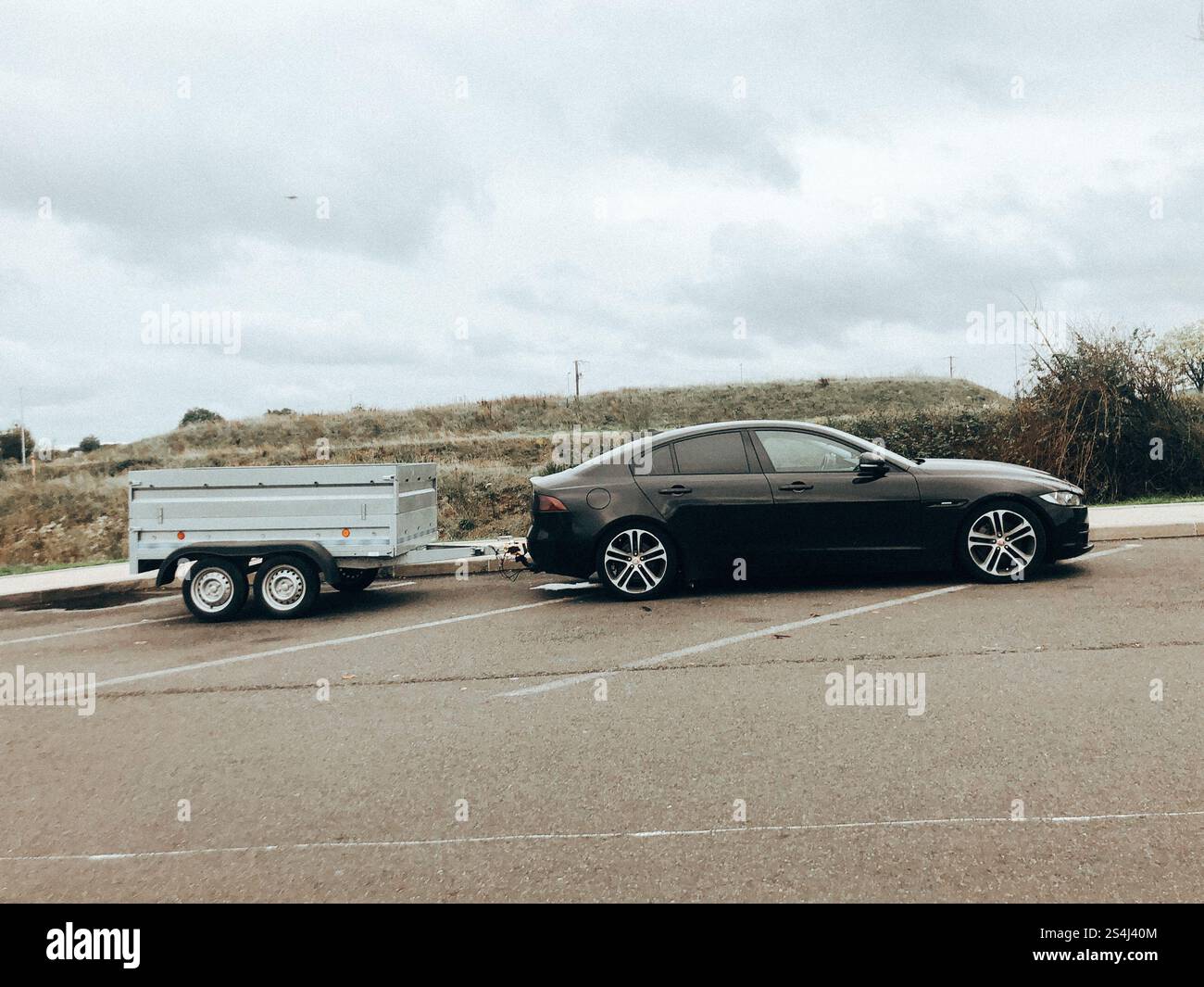 Berlin, Germany. 1 October 2023 A modern black passenger car with open ...