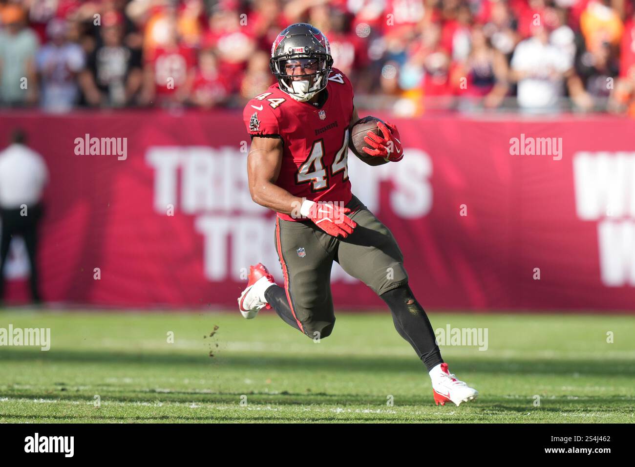Tampa Bay Buccaneers running back Sean Tucker (44) rushes with the ball ...