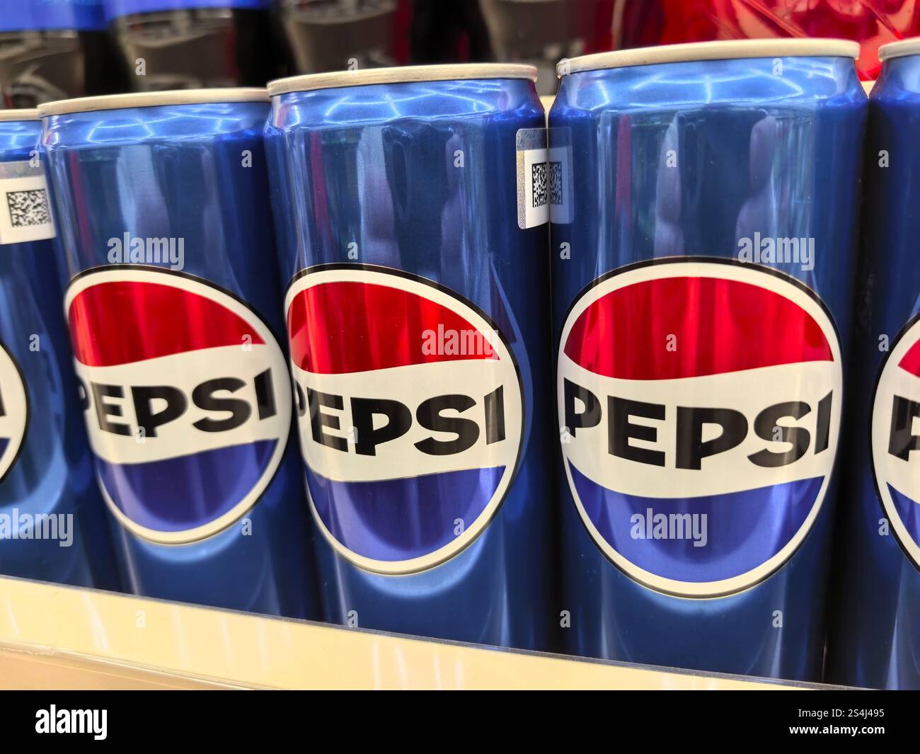 Bobruisk, Belarus - January 4, 2025: Brightly colored cans fill the ...