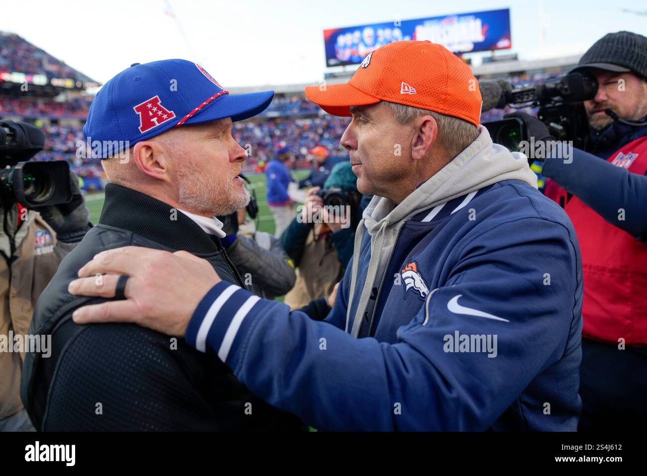 Buffalo Bills head coach Sean McDermott, left, and Denver Broncos head ...