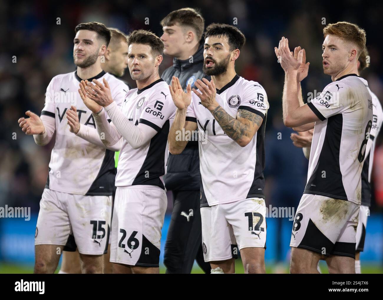 London, UK. 12th Jan, 2025. Stockport County players clap the away ...