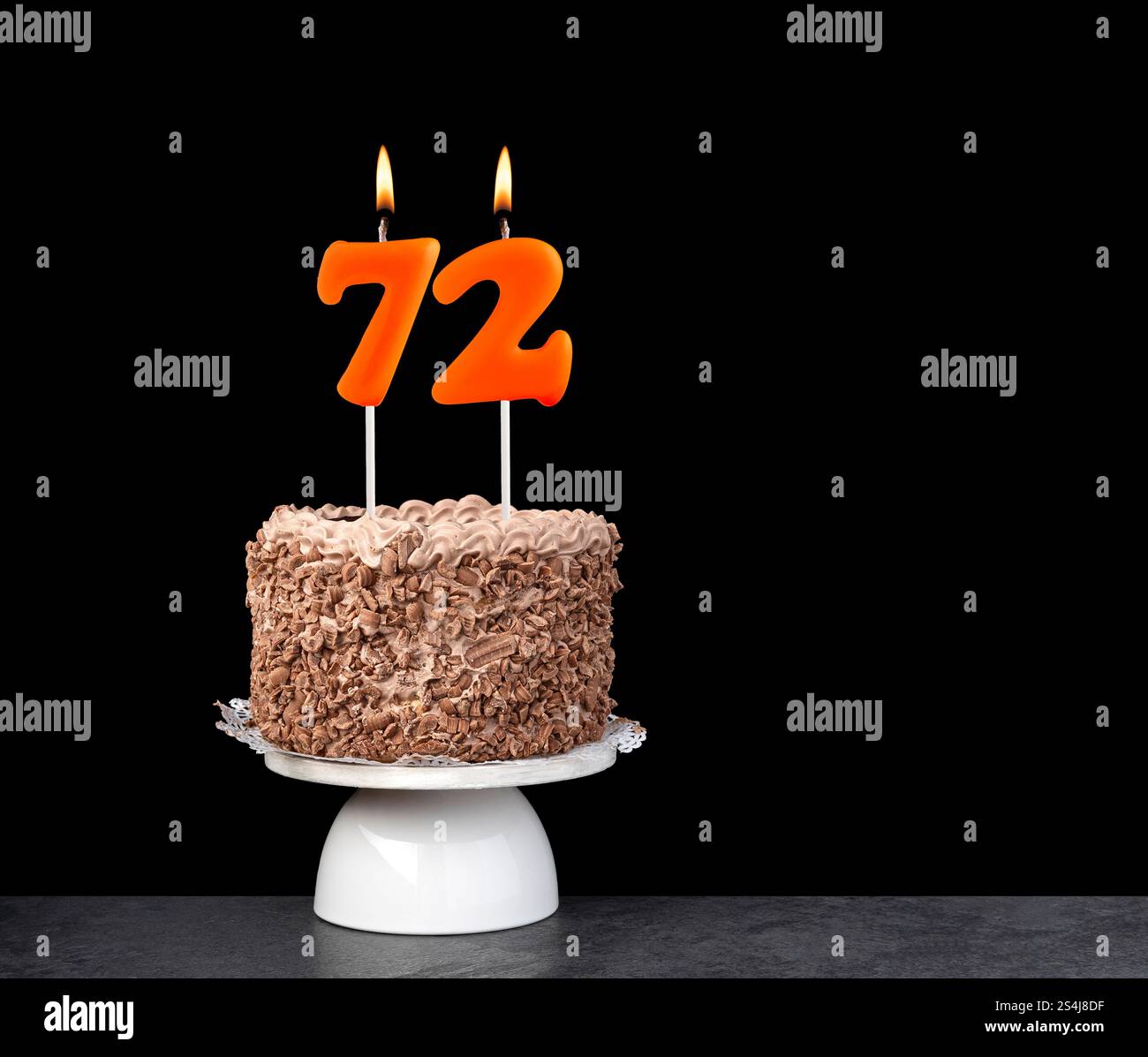 Birthday card with candle number 72 - Chocolate cake on black ...