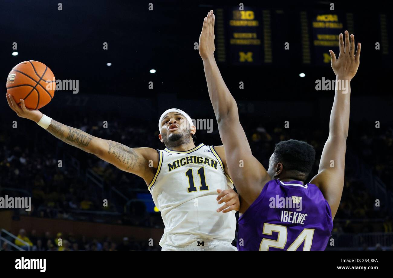 Michigan guard Roddy Gayle Jr. (11) takes a shot against Washington ...