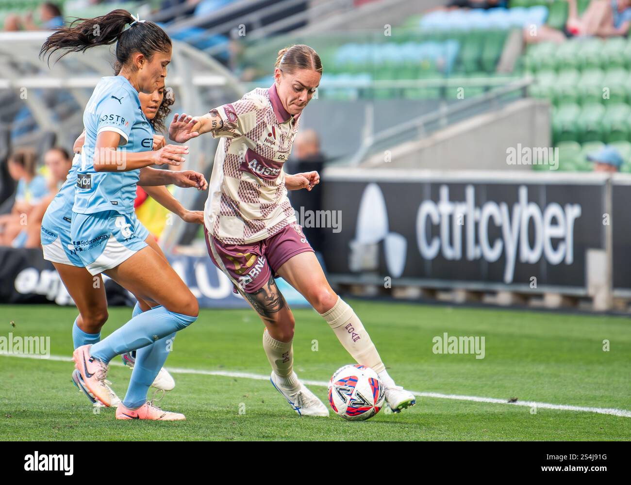 Brisbane Roar's Sharn Freier (R) and Melbourne City's Alexia ...