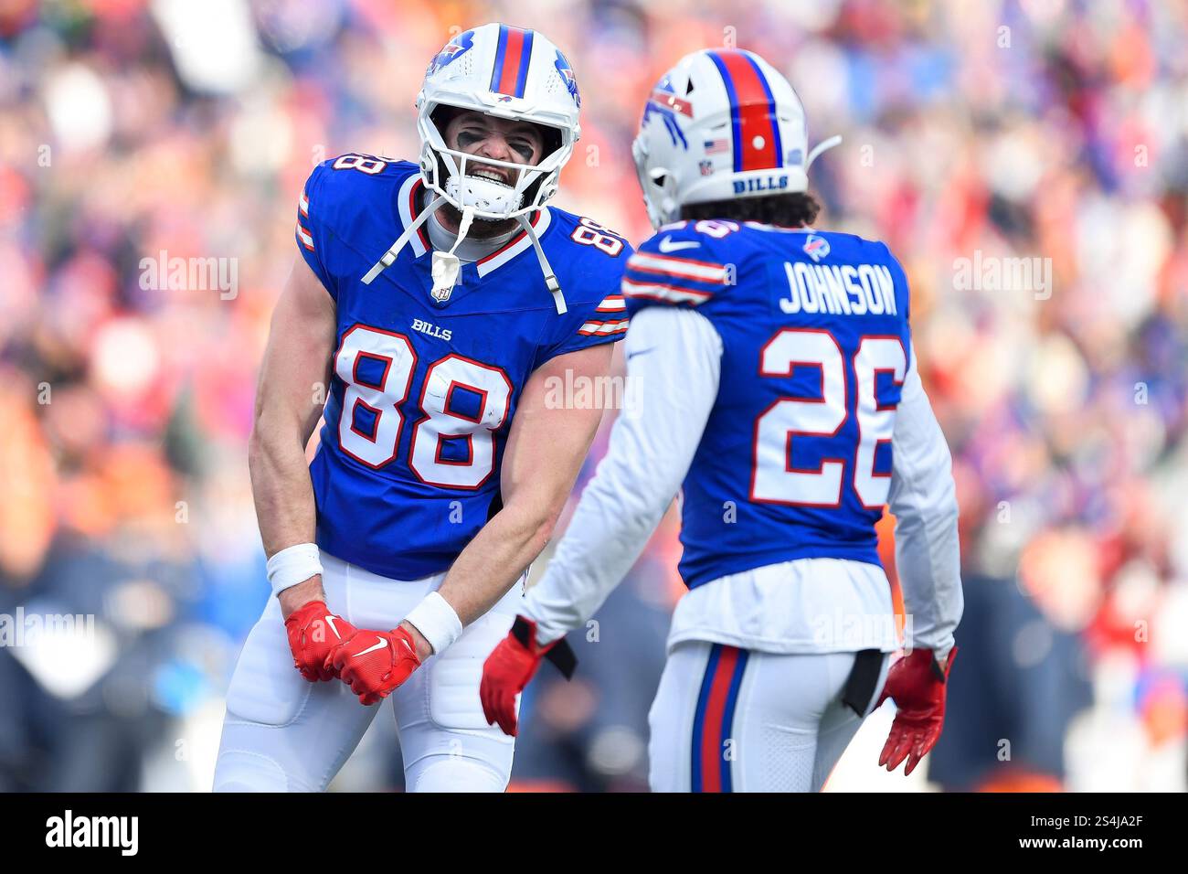 Buffalo Bills running back Ty Johnson (26) celebrates with tight end ...