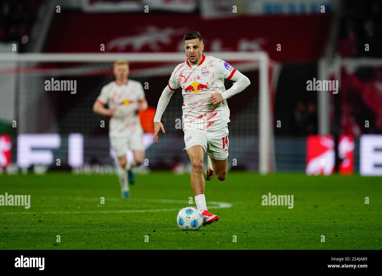 Red Bull Arena, Leipzig, Germany. 12th Jan, 2025. Christoph Baumgartner of RB Leipzig controls ...