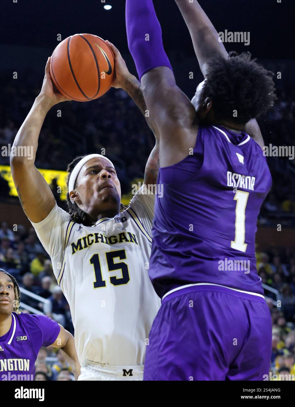 Michigan guard Rubin Jones (15) tries to pass the ball against ...
