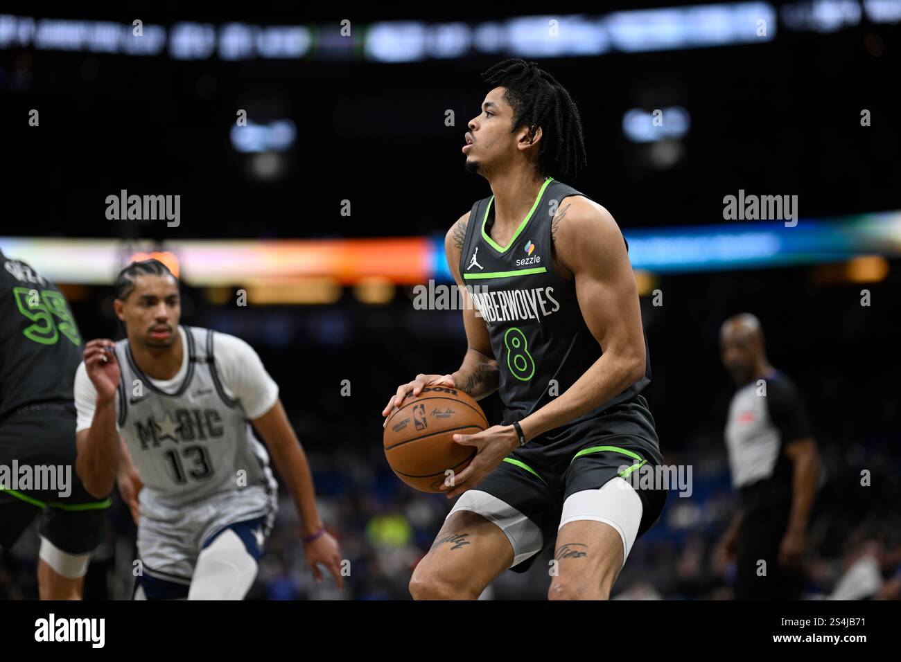 Minnesota Timberwolves forward Josh Minott (8) goes up to shoot as ...
