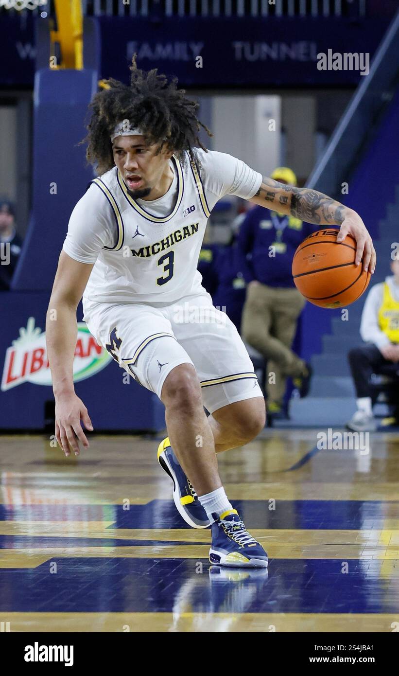 Michigan guard Tre Donaldson (3) brings the ball up court against ...