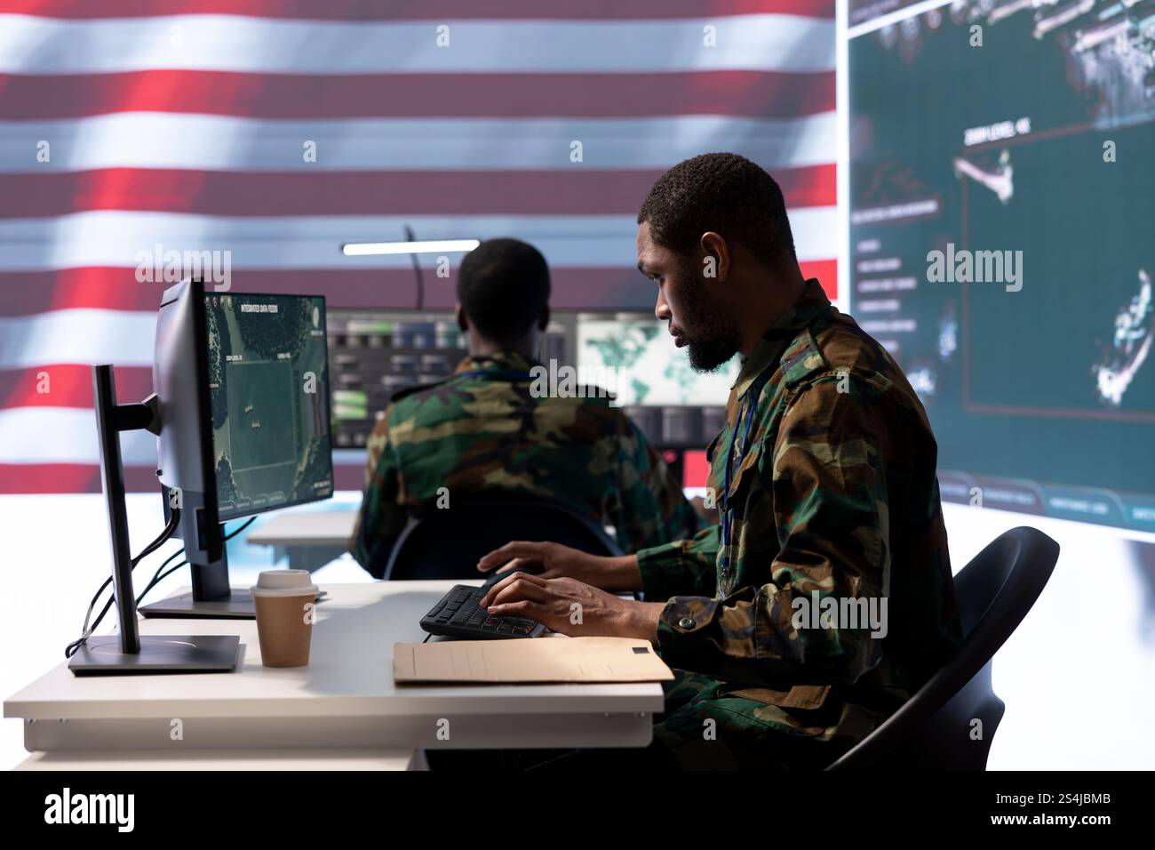 Team Of Military Personnel Manages Surveillance And Security Operations From A High Tech Command