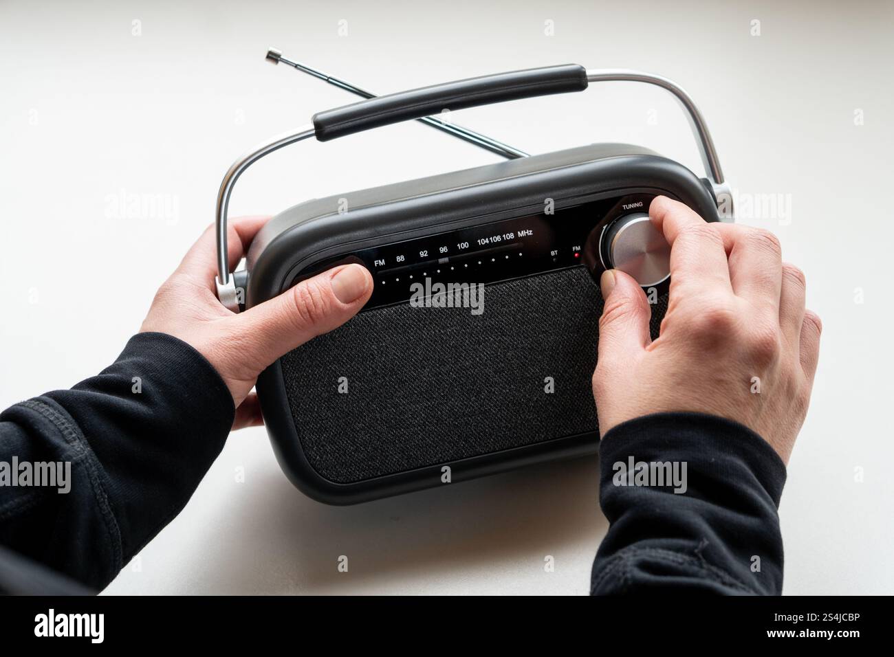 Male hand tunes radio communication hi-res stock photography and images ...