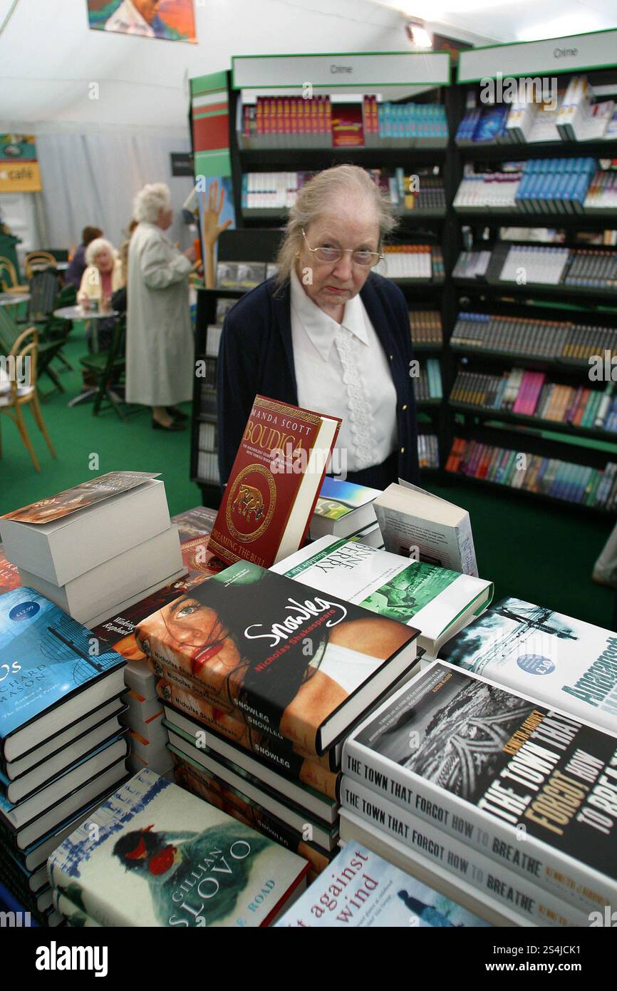 Visitors to the Edinburgh International Book Festival browse for books ...