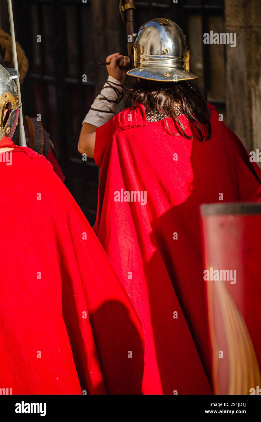 Roman legionary soldiers at a historical reenactment party on ancient ...