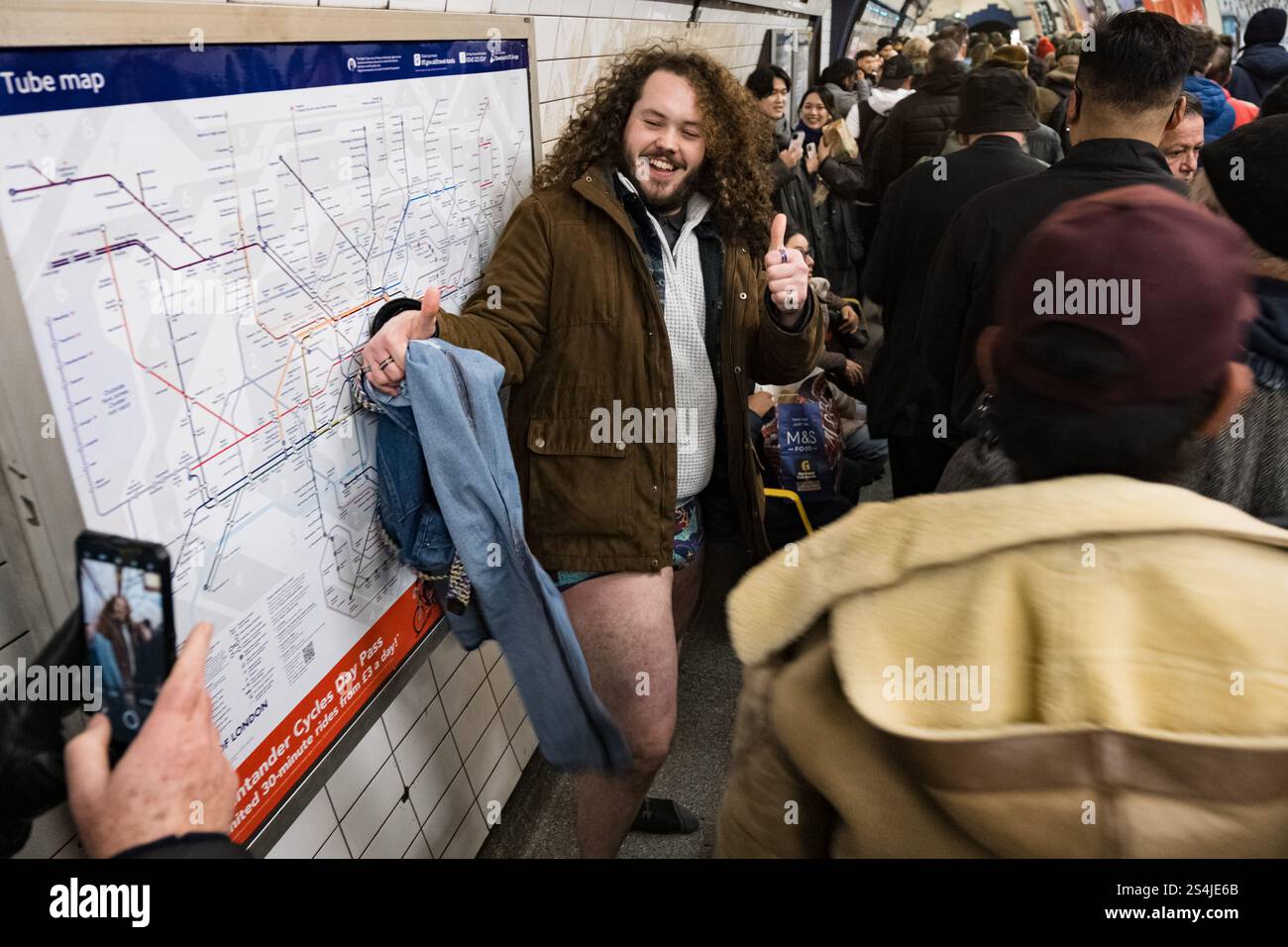 London, UK. 12th Jan, 2025. A participant is seen posing for a portrait ...