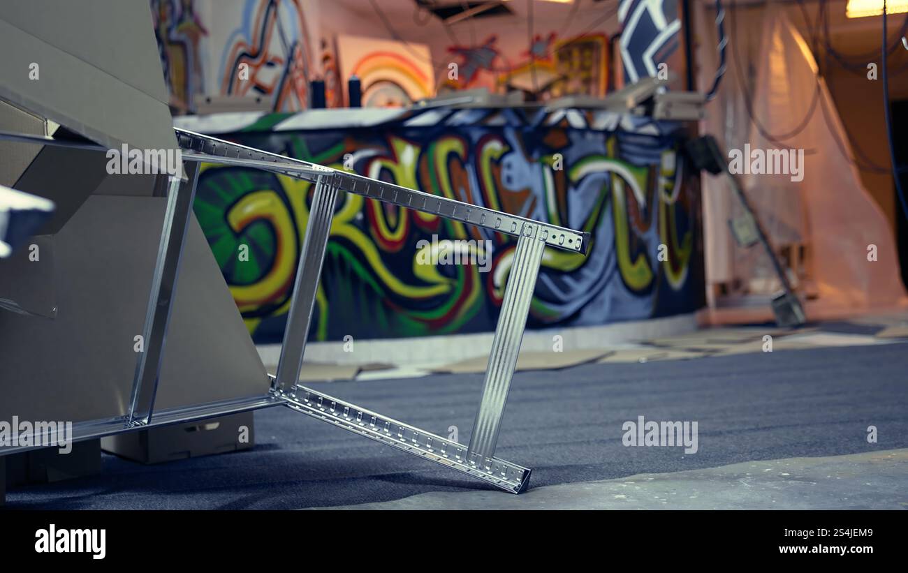 Empty basement with damaged objects and graffiti paint, concept of ...