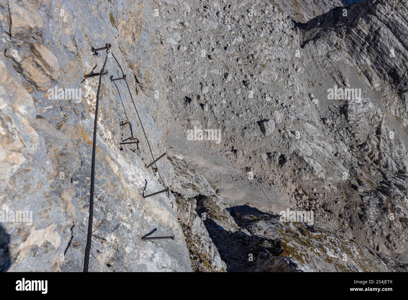 Via ferrata in the Dolomites. Equipped with bridge and steel cable ...