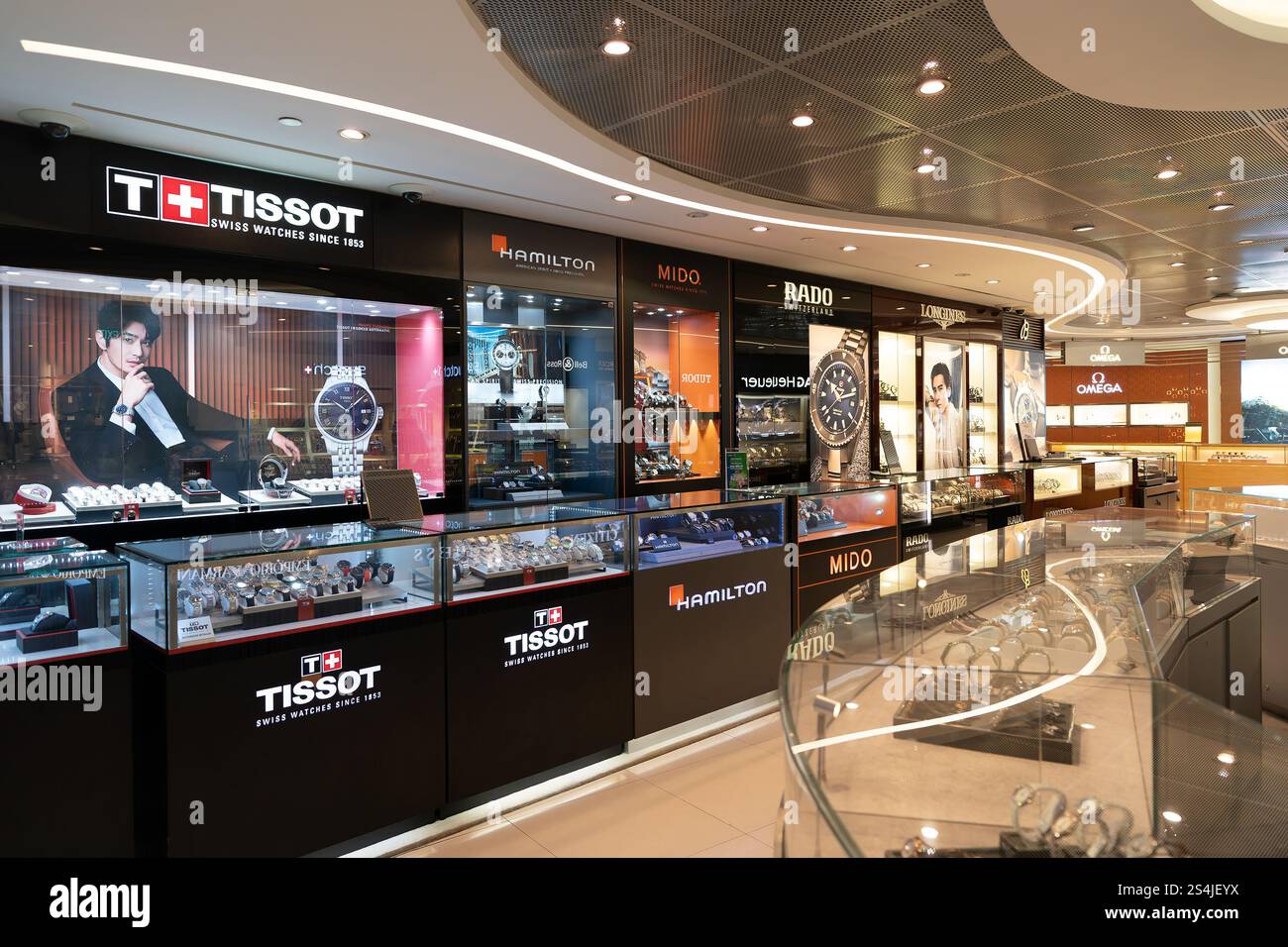 SINGAPORE - AUGUST 25, 2024: luxury wristwatches displayed at a store ...