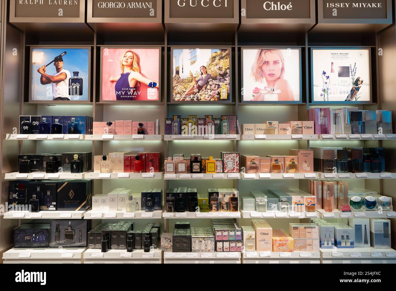 SINGAPORE - AUGUST 25, 2024: various perfumes on display at the duty-free area in Changi ...