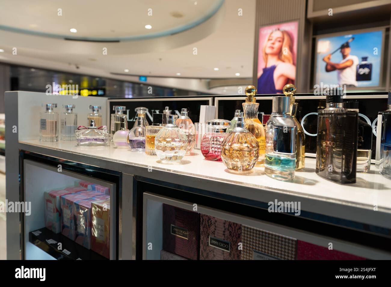 SINGAPORE - AUGUST 25, 2024: various perfumes on display at the duty-free area in Changi ...