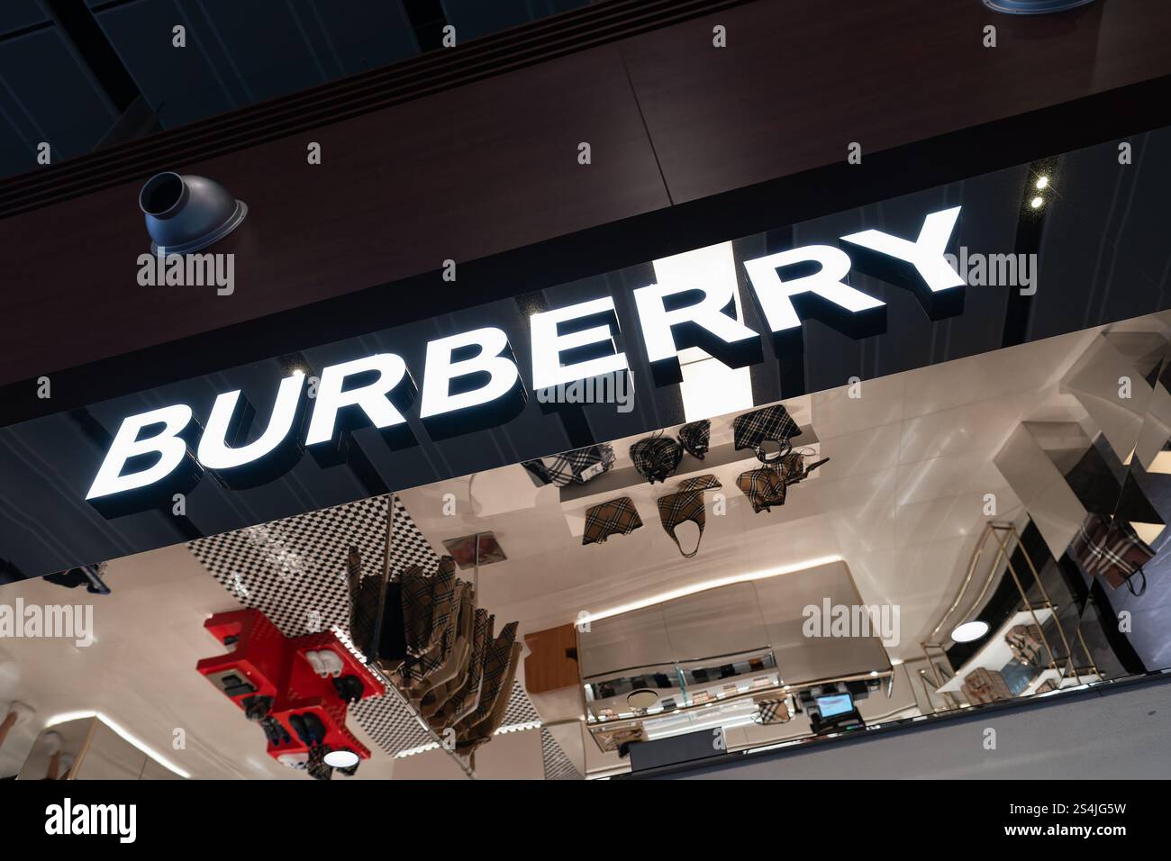 SINGAPORE - AUGUST 25, 2024: Burberry sign displayed above the store ...