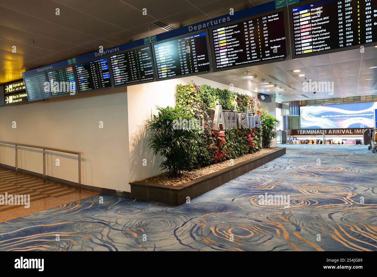 SINGAPORE - AUGUST 25, 2024: FIDS (Flight Information Display System ...