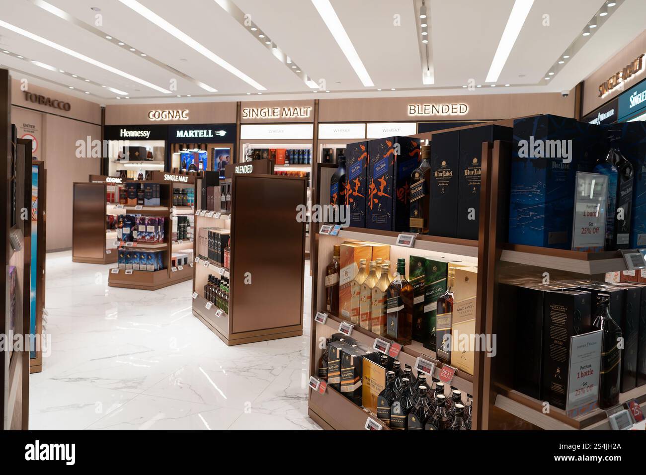 SINGAPORE - AUGUST 25, 2024: goods on display at the duty-free area in Changi International ...