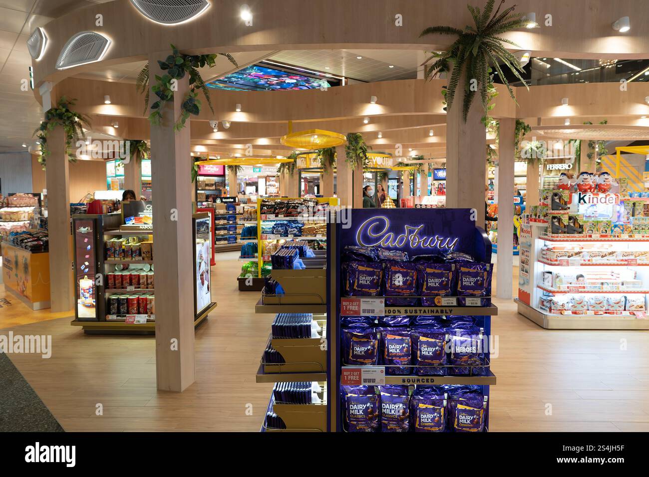 SINGAPORE - AUGUST 25, 2024: sweets on display at the duty-free area in ...