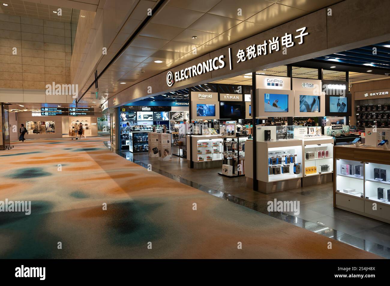 SINGAPORE - AUGUST 25, 2024: a variety of gadgets and tech essentials ...