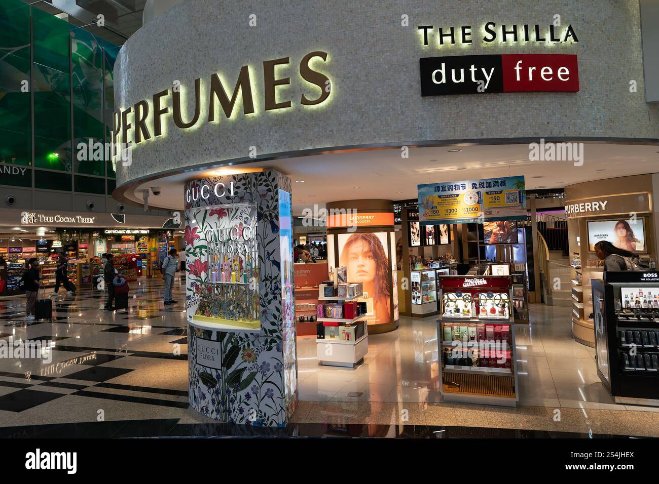 SINGAPORE - AUGUST 25, 2024: various perfumes on display at the duty-free area in Changi ...
