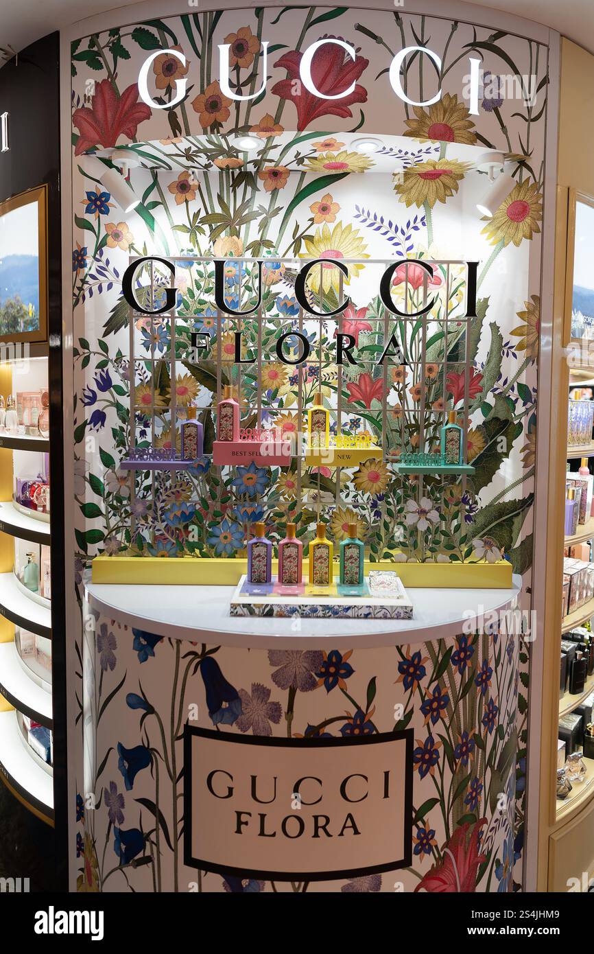 SINGAPORE - AUGUST 24, 2024: Gucci Flora fragrance collection on display at the duty-free area ...