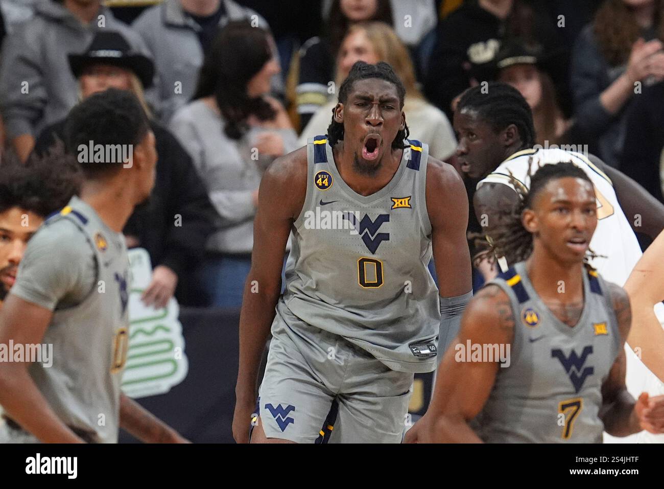 West Virginia center Eduardo Andre (0) reacts after scoring in the ...