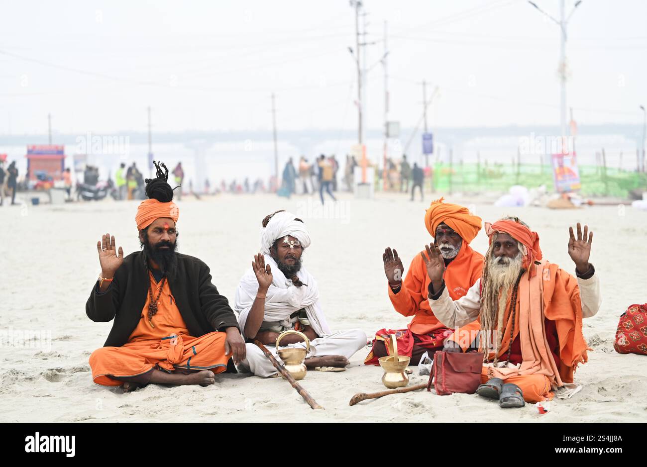 PRAYAGRAJ, INDIA - JANUARY 12: A group of Sadhu's sitting at the bank ...