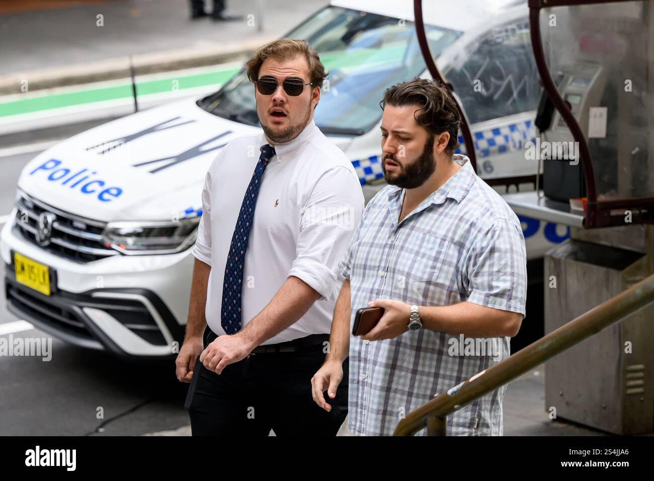 Sydney, Australia. 13th Jan, 2025. William Gulson (left) arrives at the ...