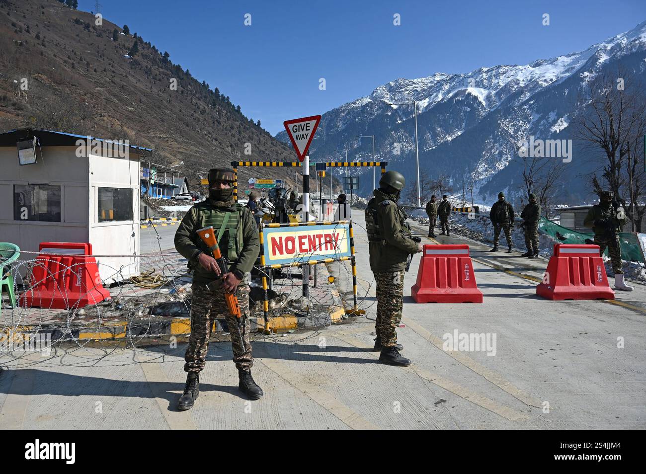 SRINAGAR, INDIA - JANUARY 12: Paramilitary soldiers stand guard near Z ...