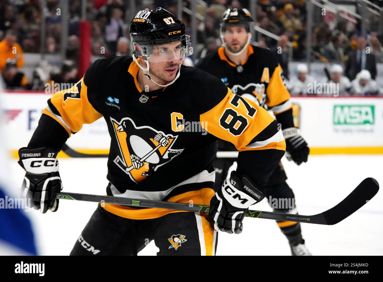 Pittsburgh Penguins' Sidney Crosby (87) prepares to take a face off during the second period of ...