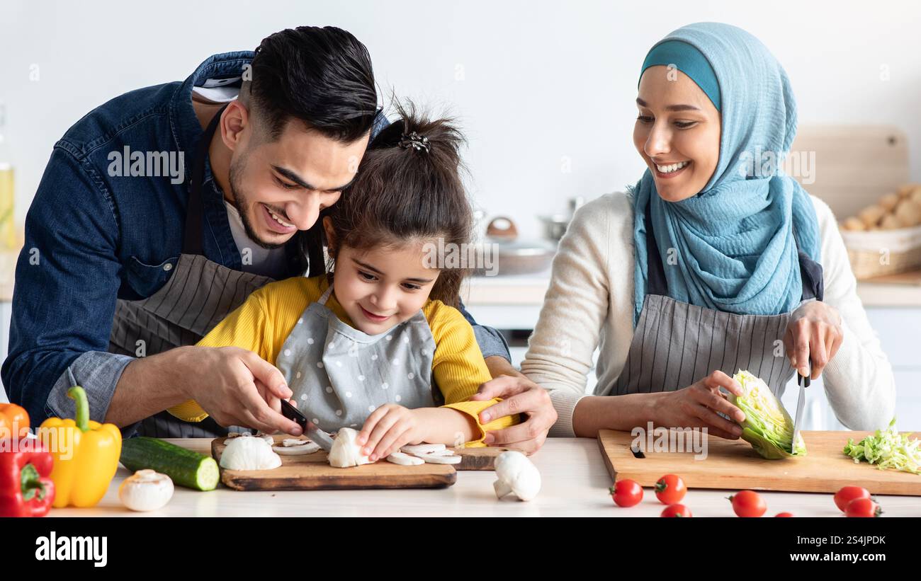 Loving Muslim Parents Teaching Their Little Daughter How To Cook ...