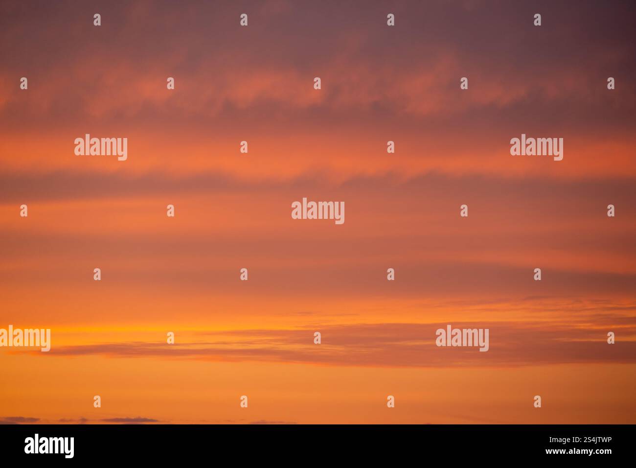 Layers Of Clouds Catch The Fading Sunset Over Pacific Ocean Stock Photo ...