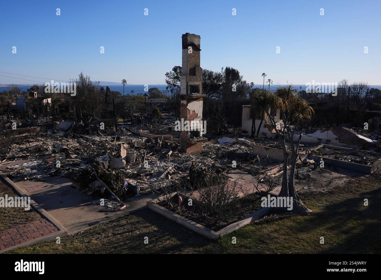 Damage is seen to a home in the aftermath of the Palisades Fire on ...