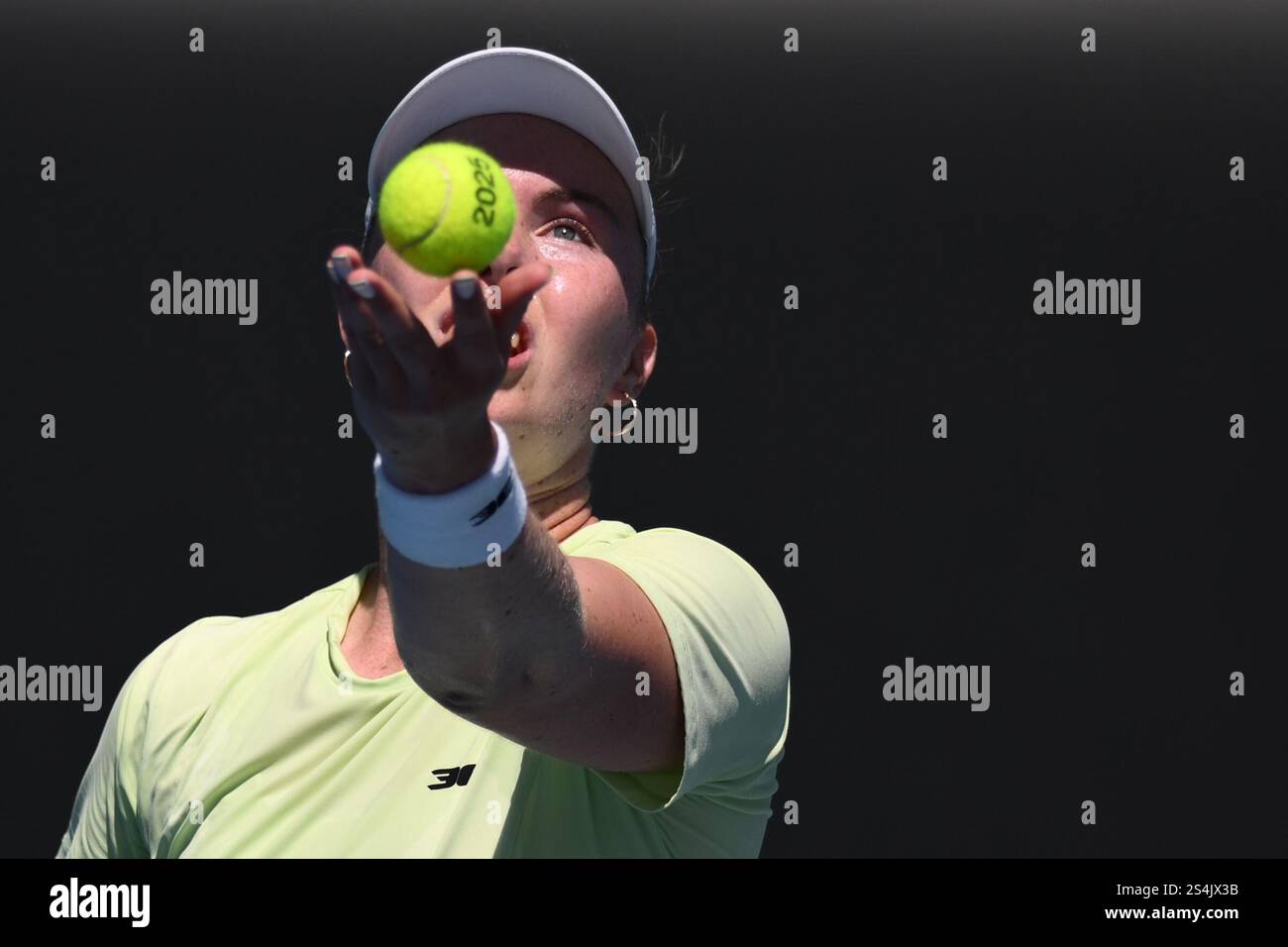 Talia Gibson of Australia prepares to serve during her round 1 match ...