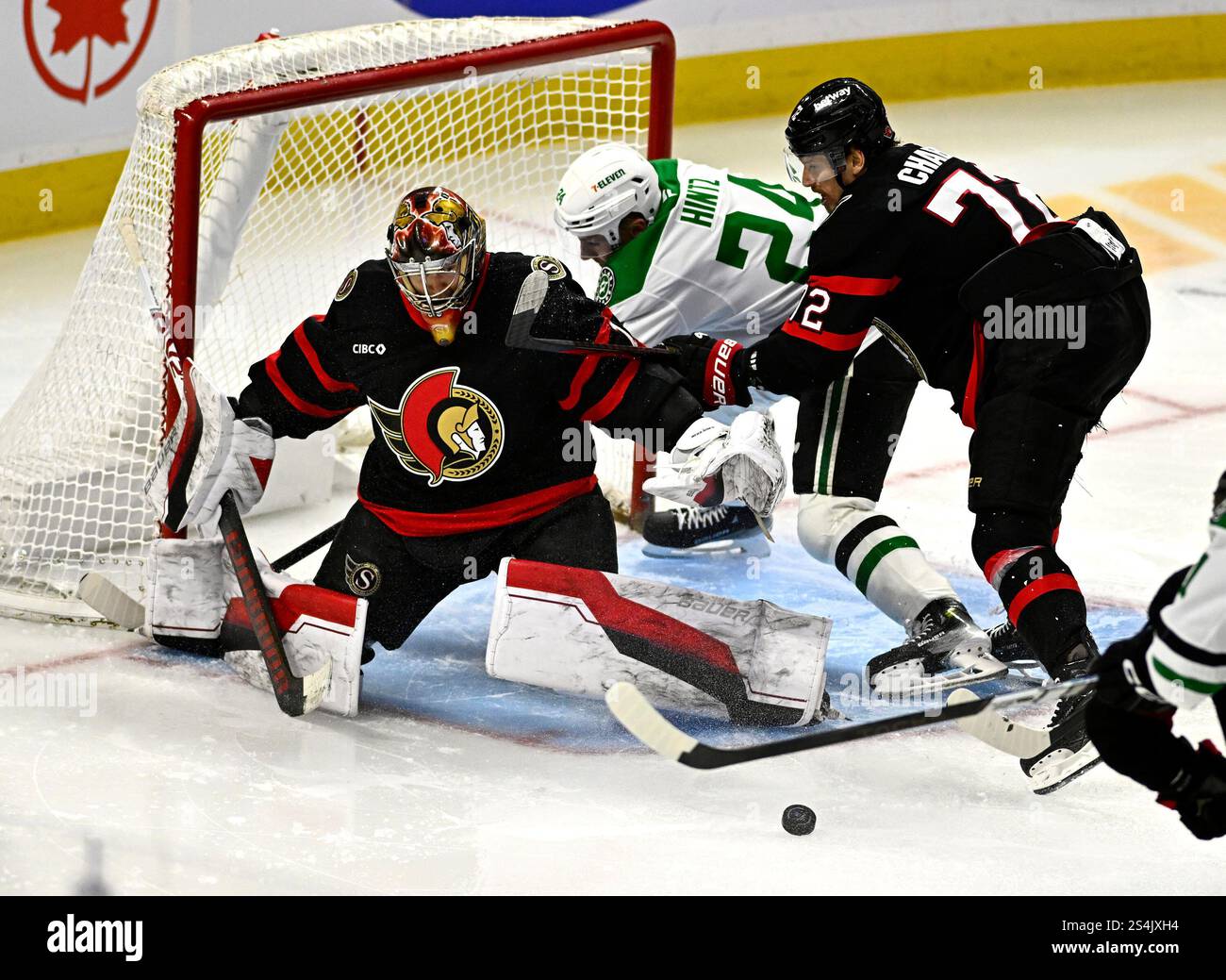 Ottawa Senators goaltender Leevi Merilainen (1) watches a rebound after ...