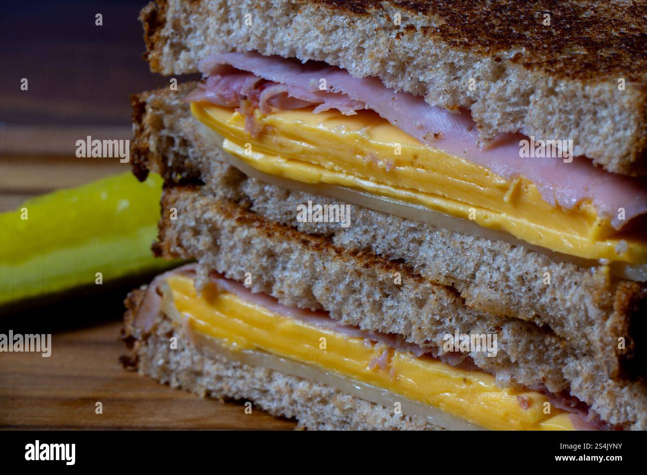Stacked Grilled Ham and American Cheese Sandwich with Pickle Stock ...