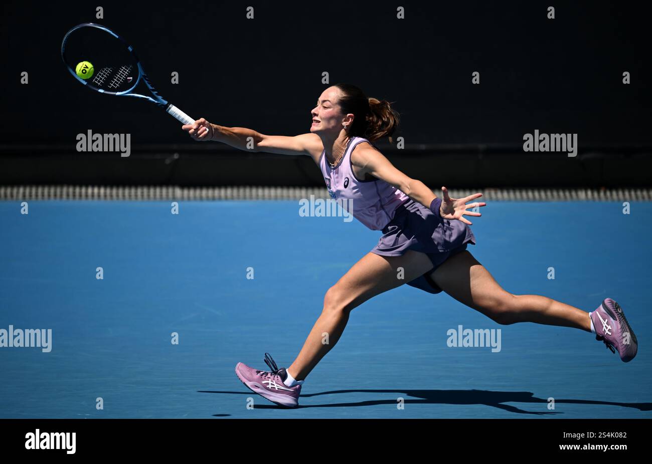 Zeyneo Sonmez of Turkey returns during her round 1 match against Talia ...