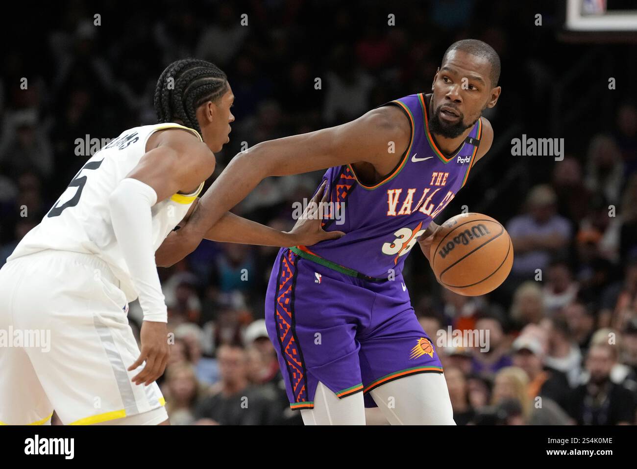 Phoenix Suns forward Kevin Durant (35) dribbles the ball against Utah ...