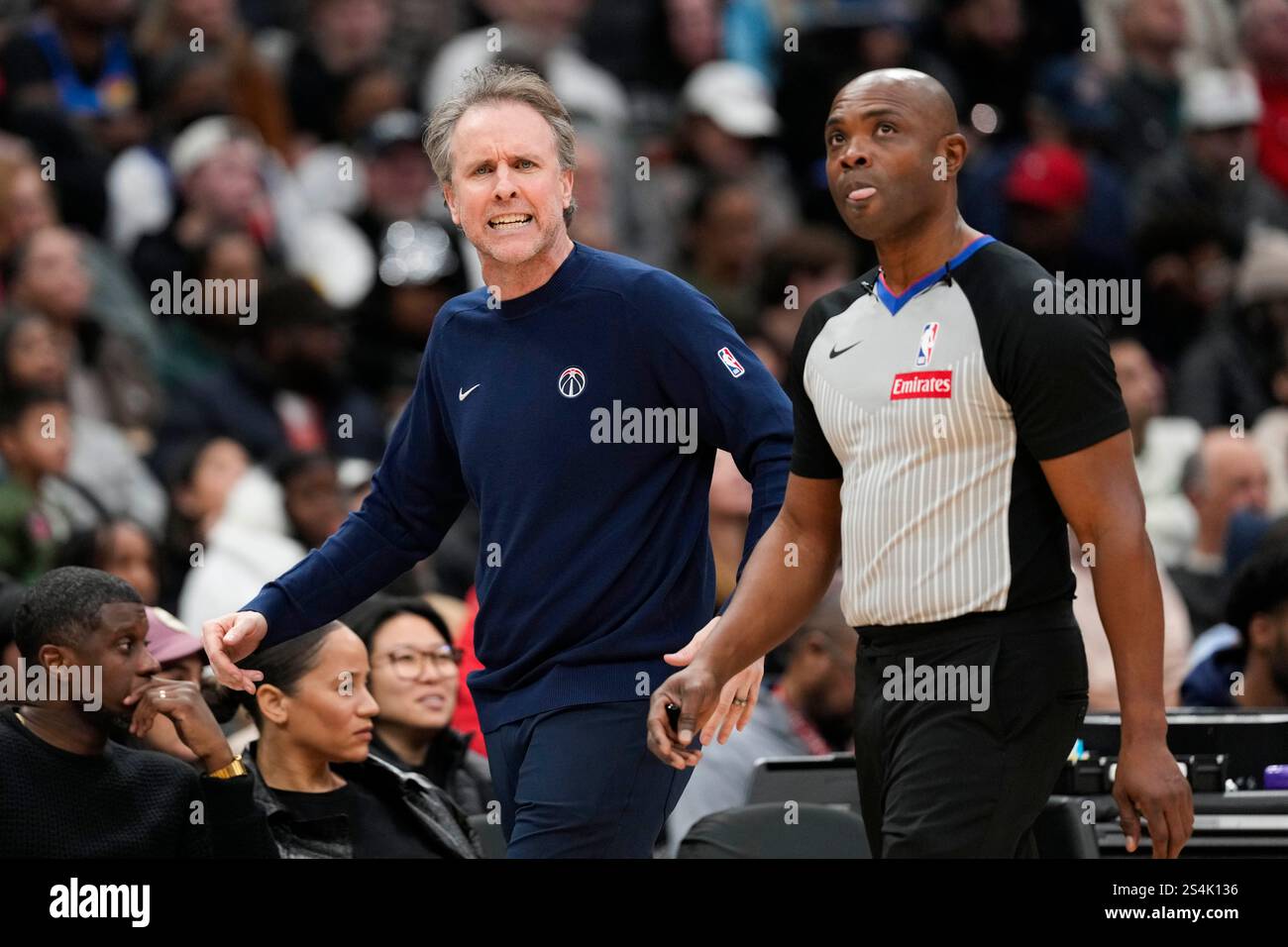 Washington Wizards head coach Brian Keefe yells to referee Courtney ...