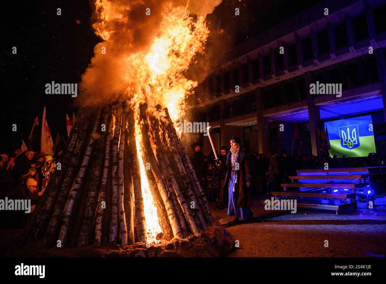 Ukrainian woman lights a bonfire at the Independence Square near the ...