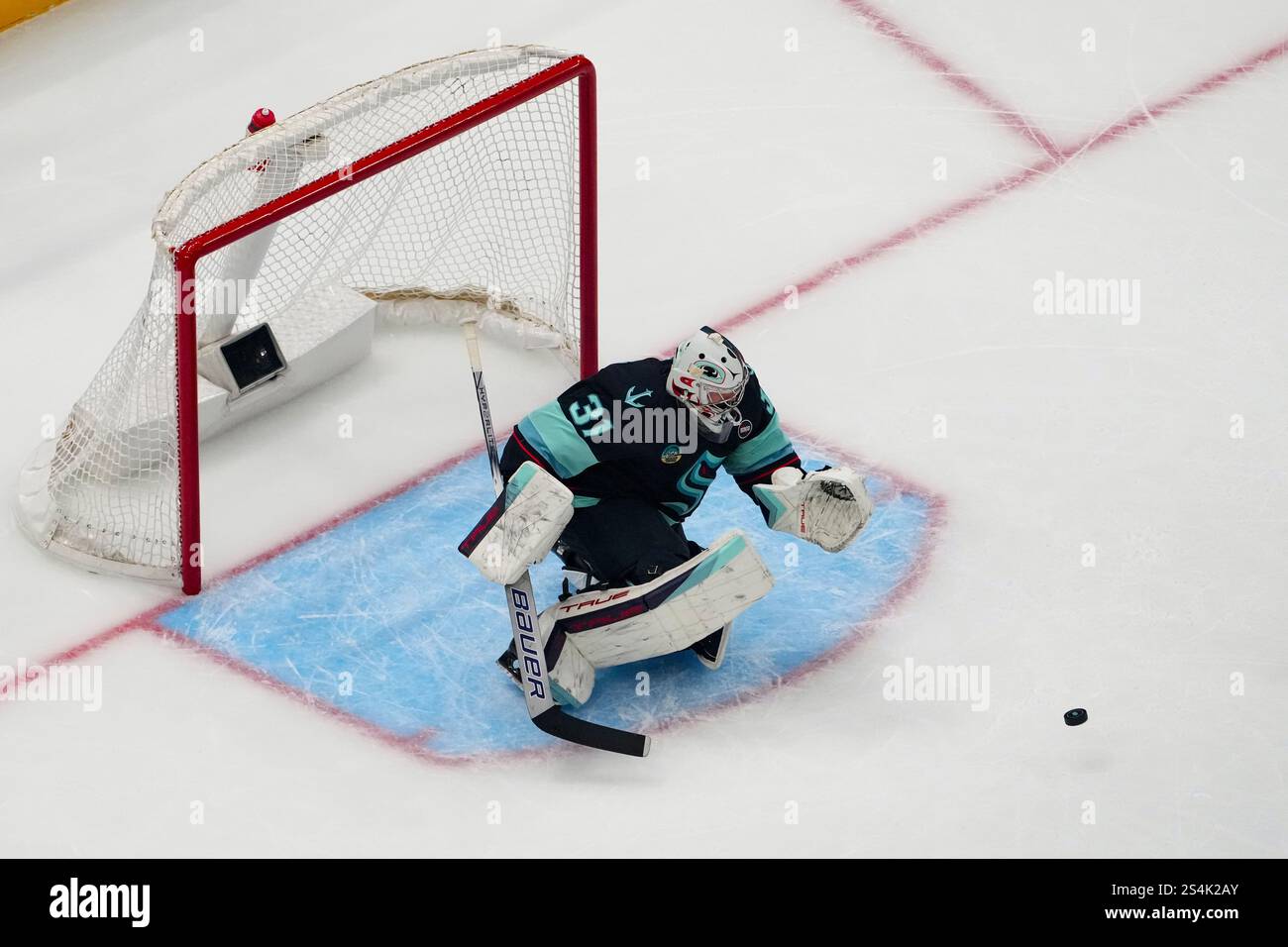 Seattle Kraken goaltender Philipp Grubauer makes a save against the New ...