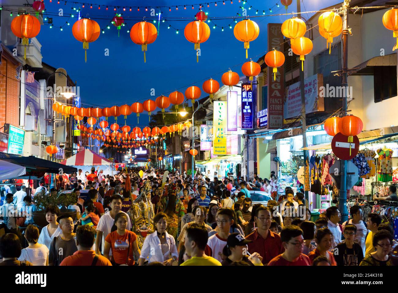 Georgetown, Penang, Malaysia - February 3, 2017: Crowded street scene ...