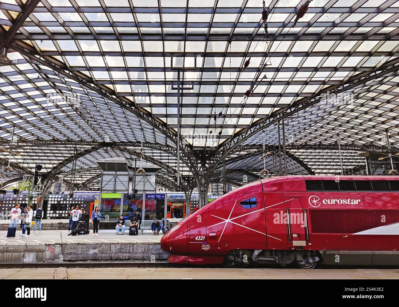 Cologne Central Station with Eurostar high-speed train and view of the ...