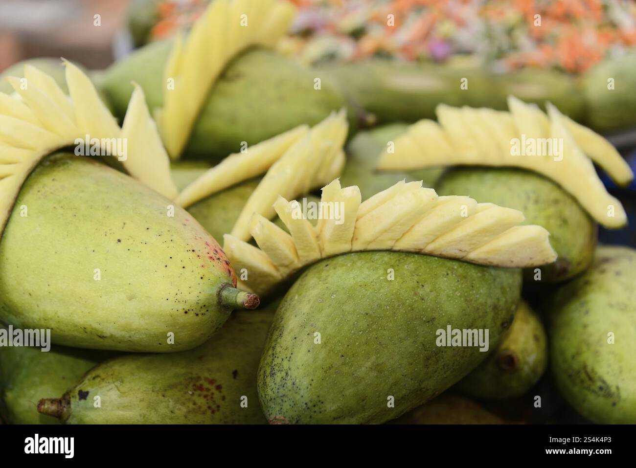 Kovalam Beach, South India, India, Asia, Freshly cut mango pieces ...
